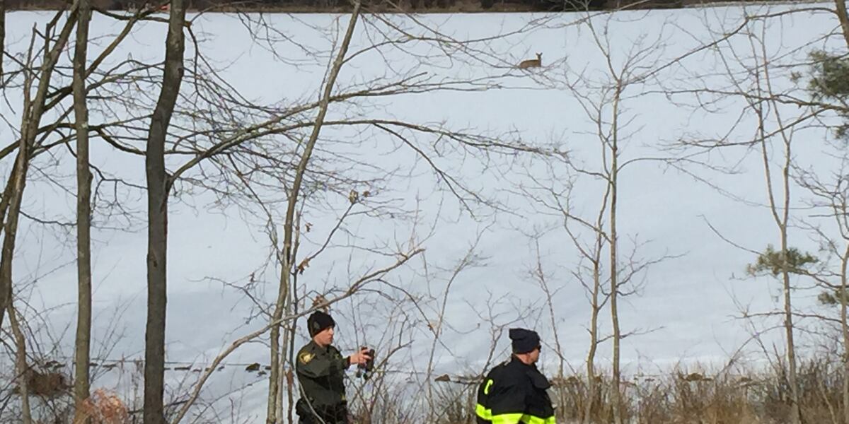 Indiana firefighters rescue deer trapped on ice Indiana firefighters rescue deer trapped on ice